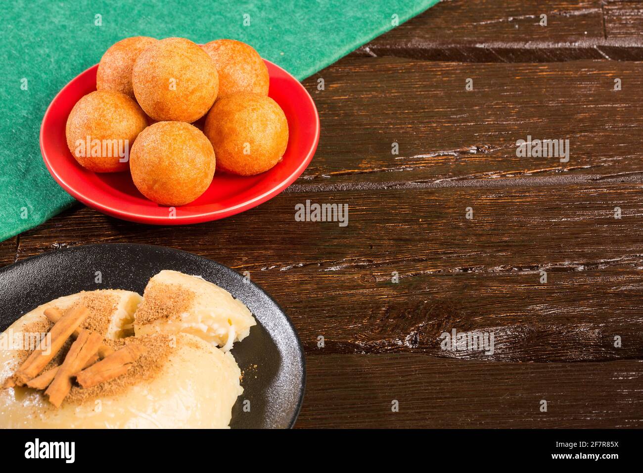 Traditional Colombian bunuelos (Deep Fried Cheese Bread) and natilla on ...