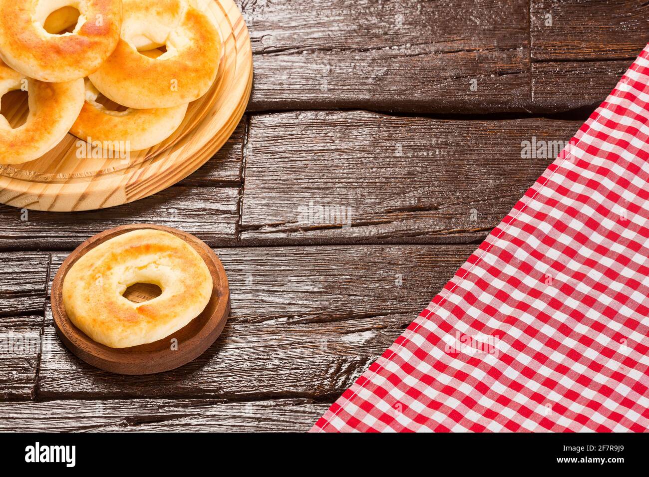 Pandequeso traditional Colombian food. Wood table Stock Photo - Alamy