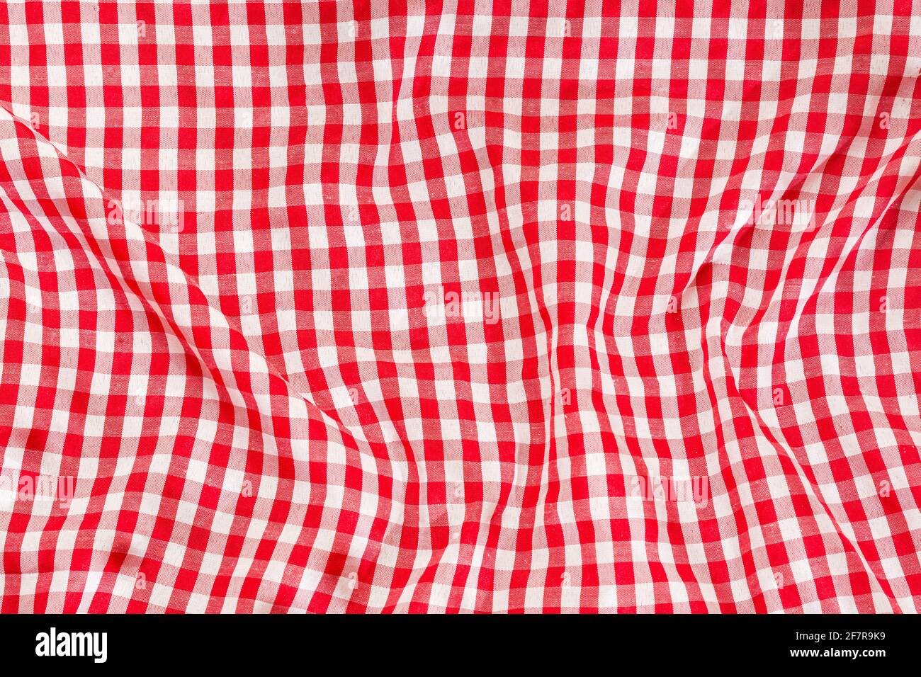 Red checkered napkin background - Top view Stock Photo - Alamy