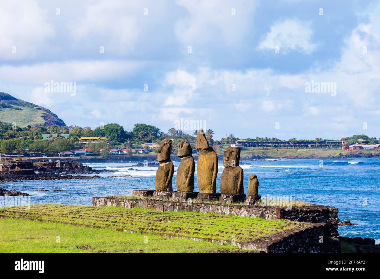 Ahu Vai Ure moai (statues) with their backs to the Pacific Ocean coast ...