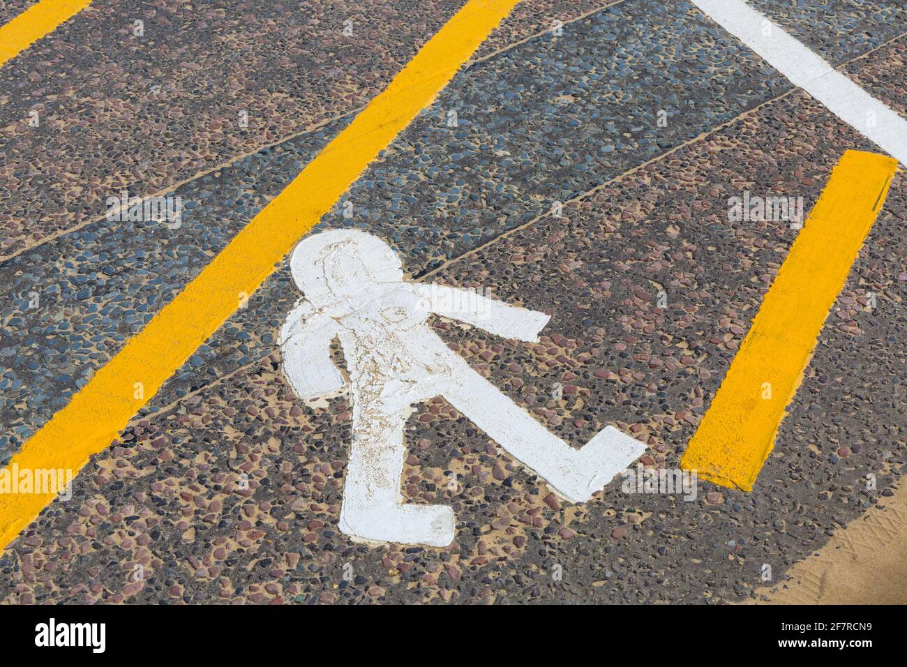 pedestrian walking sign with yellow lines on promenade at Bournemouth ...