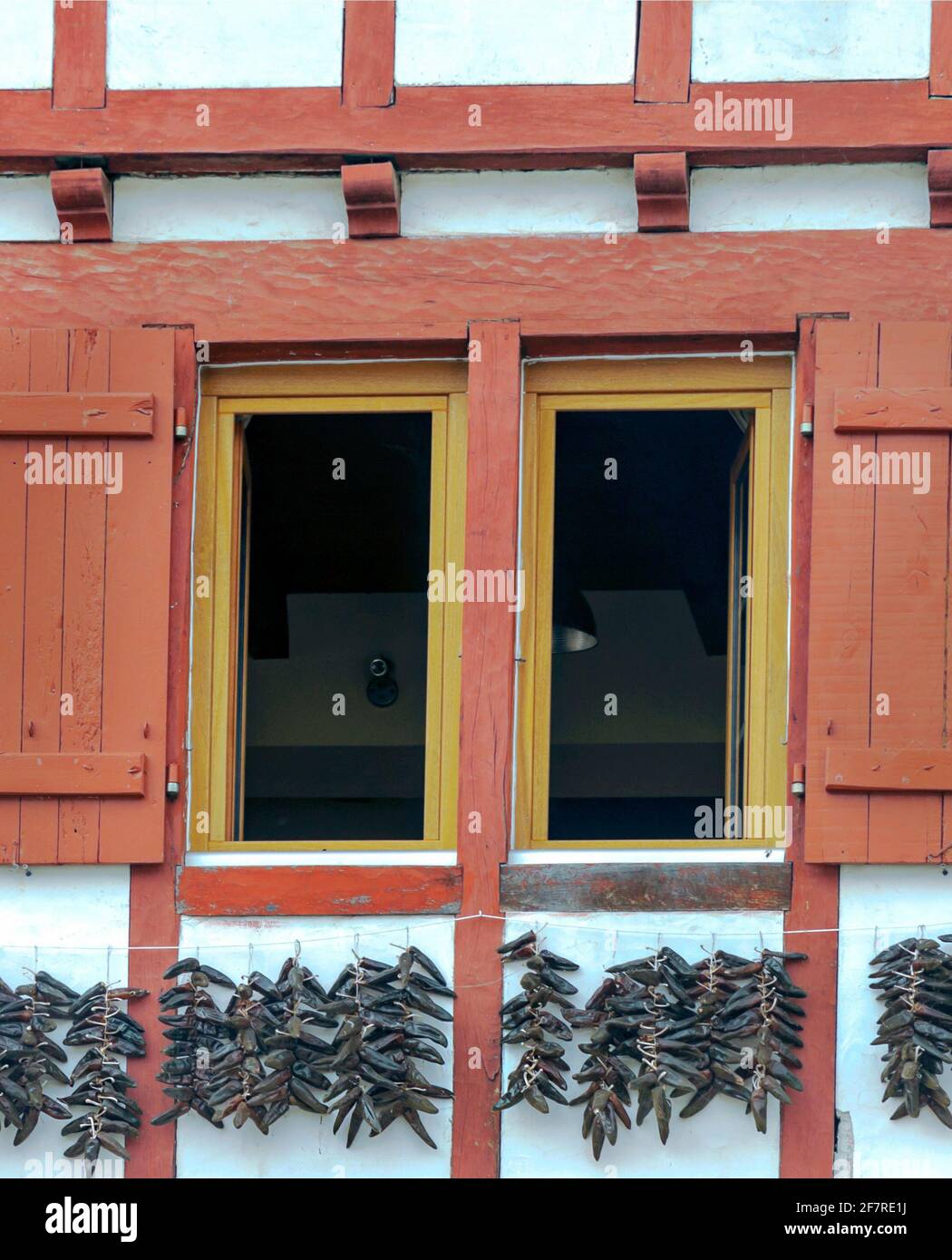 Red wood window in a white wall Stock Photo - Alamy