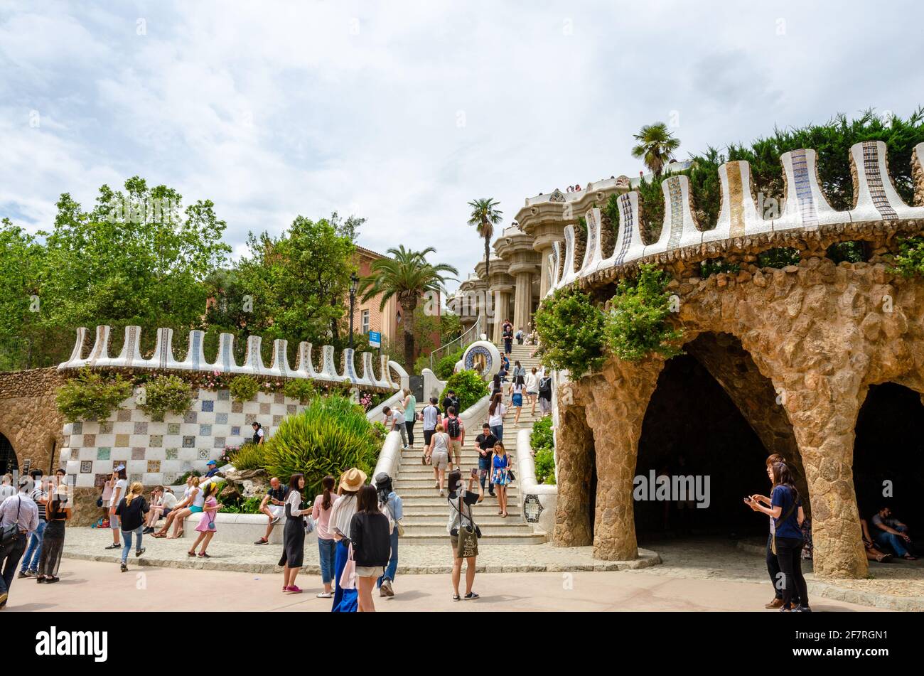Barcelona Parc Guell Gaudi mosaic dragon terrace pillars and staircase ...