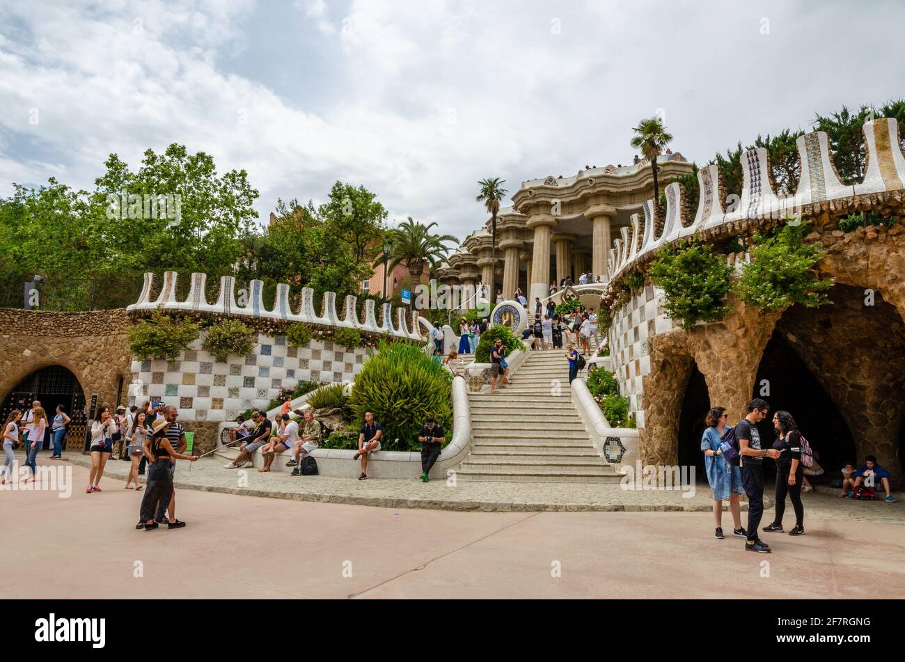 Barcelona Parc Guell Gaudi mosaic dragon terrace pillars and staircase ...