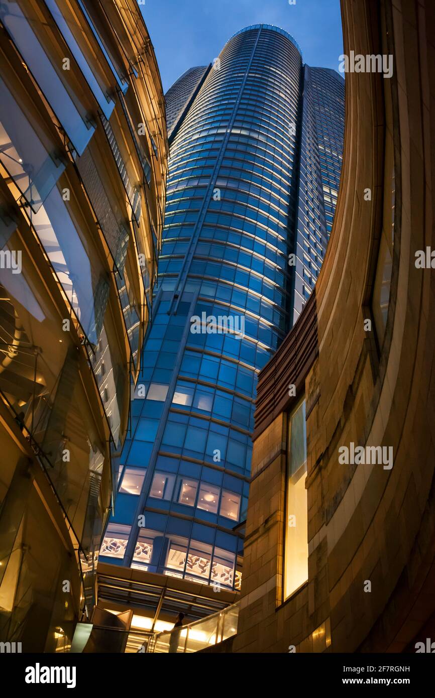Low angle view of the illuminated Mori Tower in Roppongi Hills, mega ...