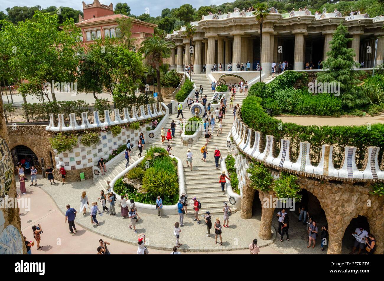 Barcelona Parc Guell Gaudi mosaic dragon terrace pillars and staircase ...