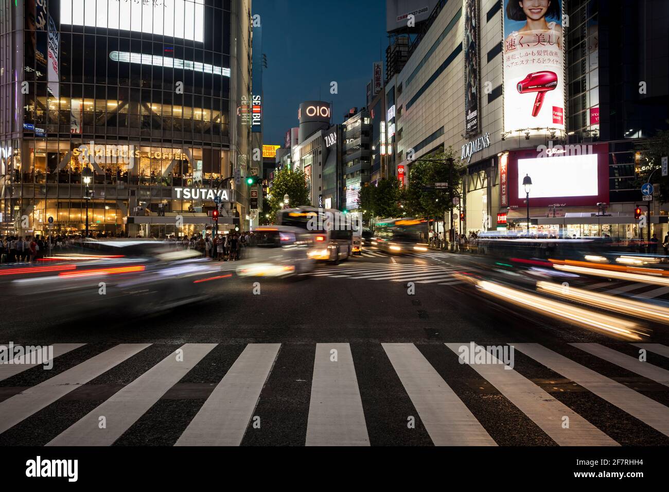 Horizontal night view of the traffic hustle and bustle in Shibuya ...