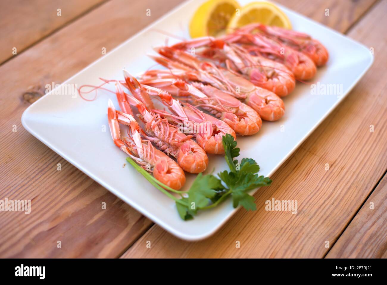 boiled crayfish, with oil and lemon sauce, on a plate, karavides in ...