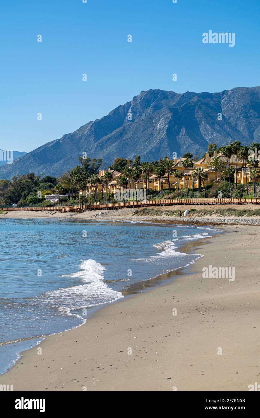 a spring walk along one of the many beaches located in Marbella with ...