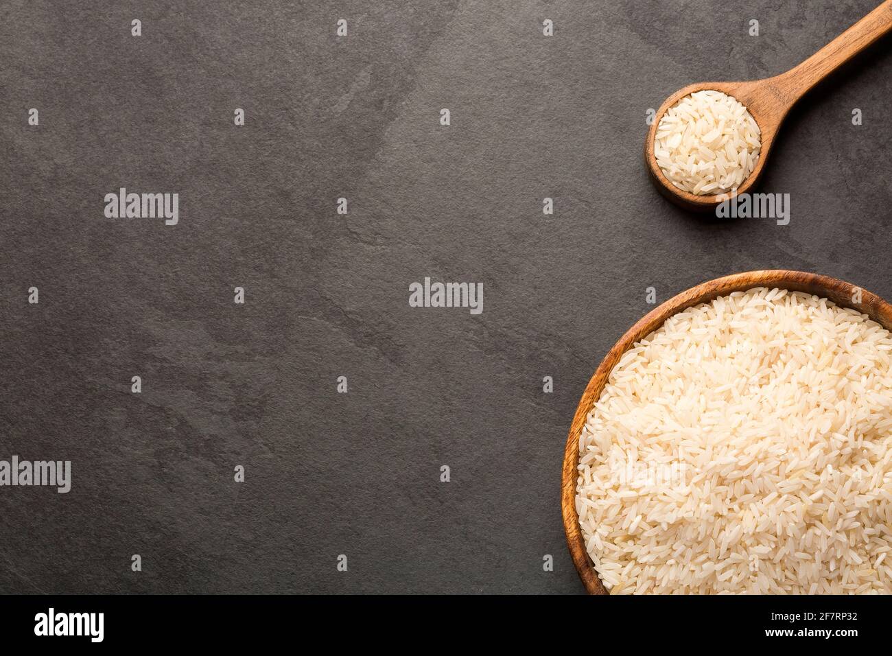 Raw white rice - Oryza sativa. Top view Stock Photo - Alamy