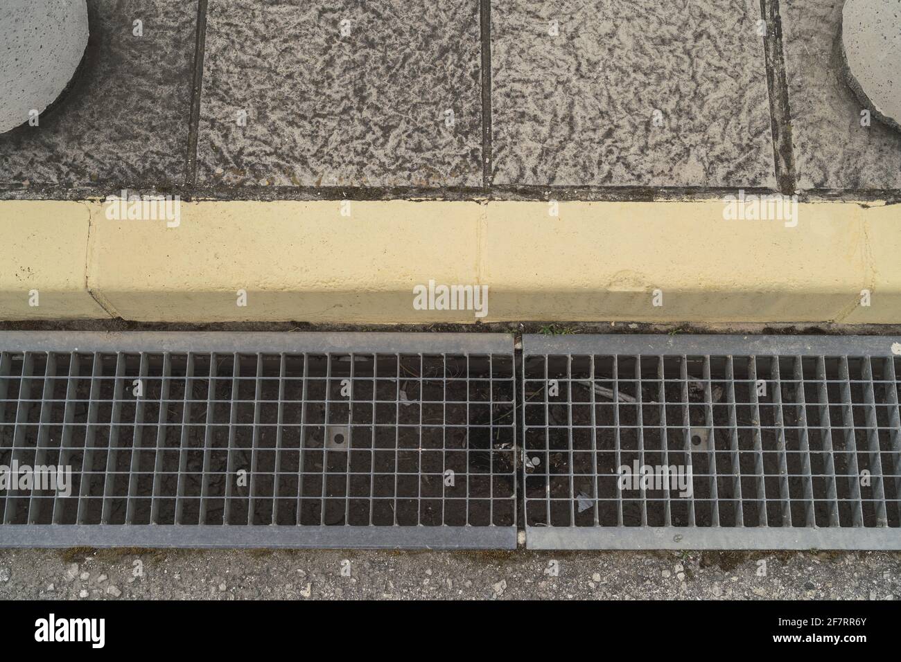 Stormwater drainage system on a city street Stock Photo - Alamy