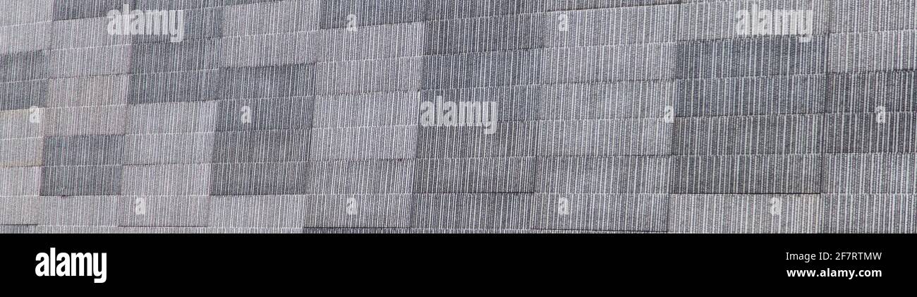 Gray patchwork concrete wall with horizontal squares Stock Photo - Alamy