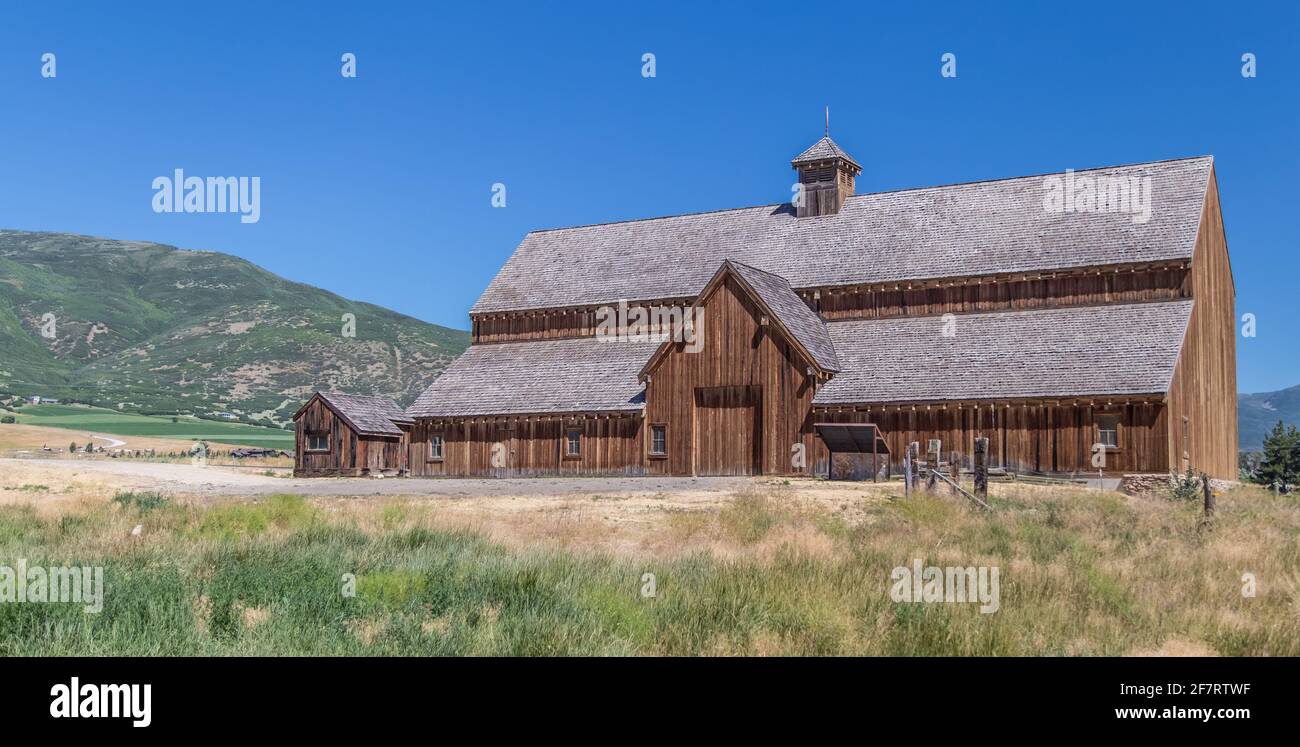 Large brown barn in the country Stock Photo - Alamy