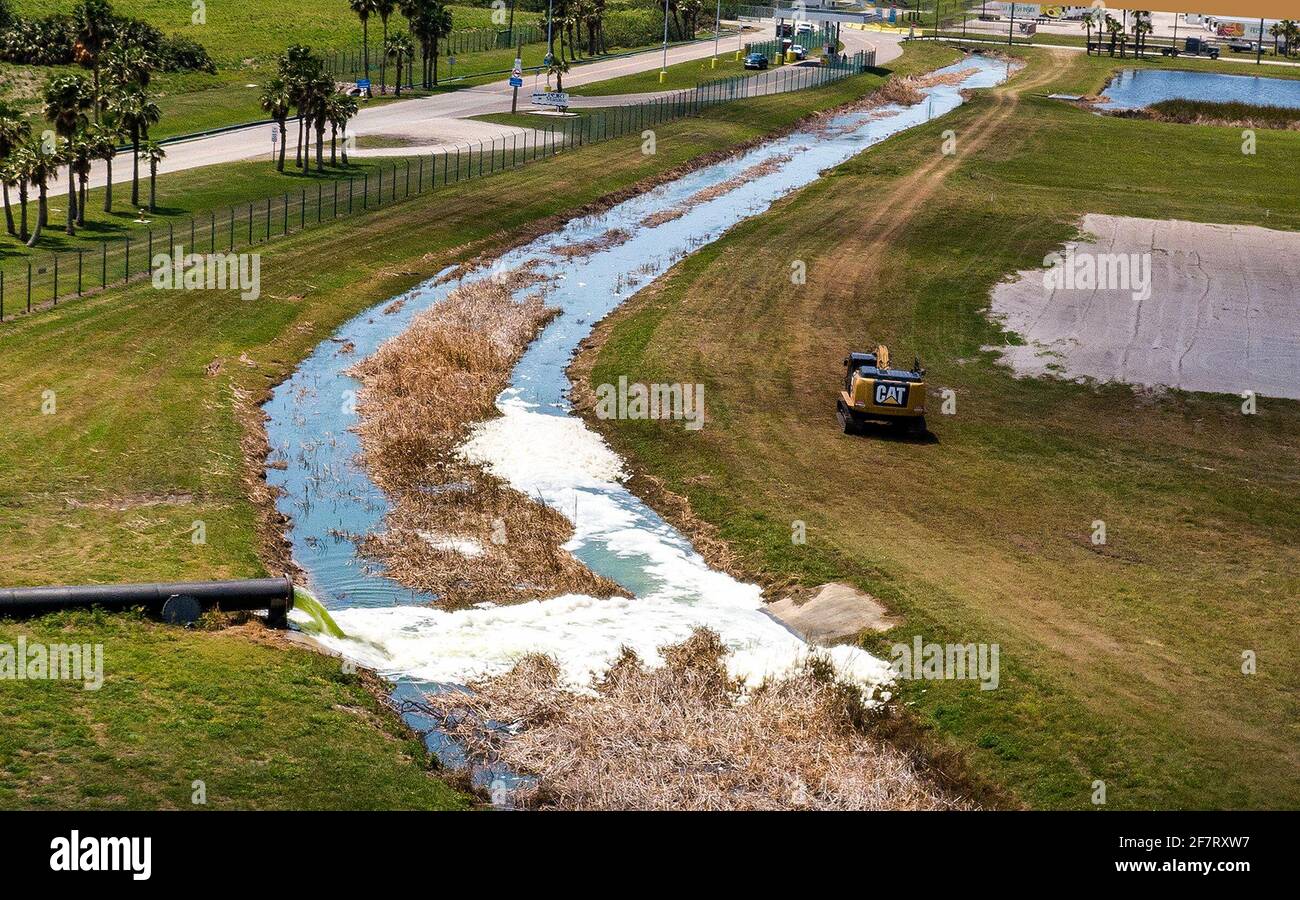View of water being pumped out of the south pond of Piney Point and ...