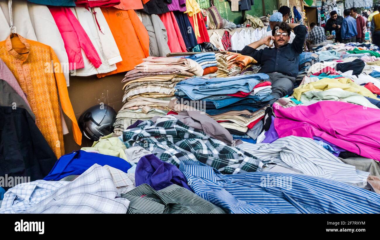 Kolkata, West Bengal, India - January 2018: A street vendor sitting on ...