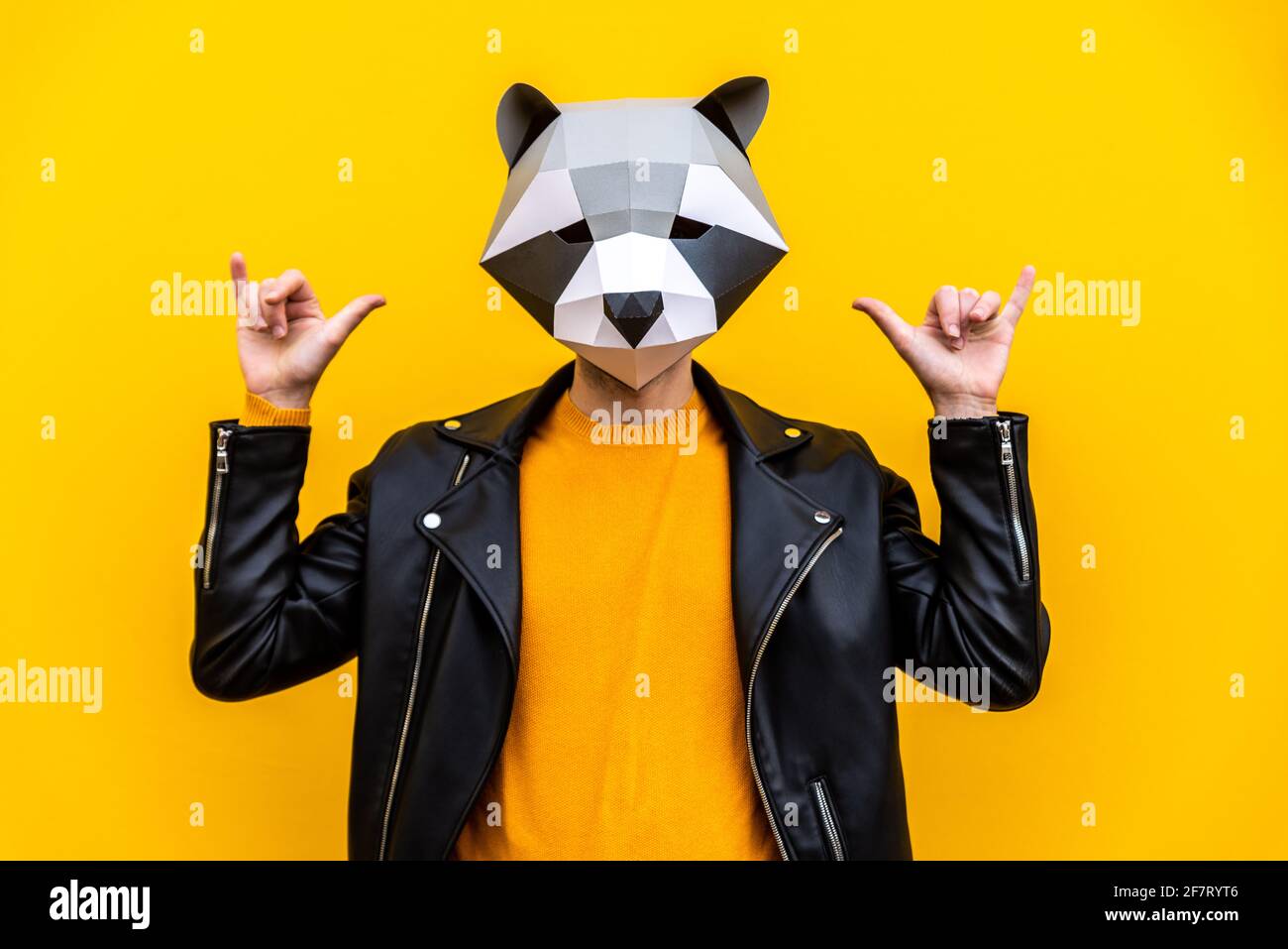 Happy man with funny low poly mask on colored background - Creative ...