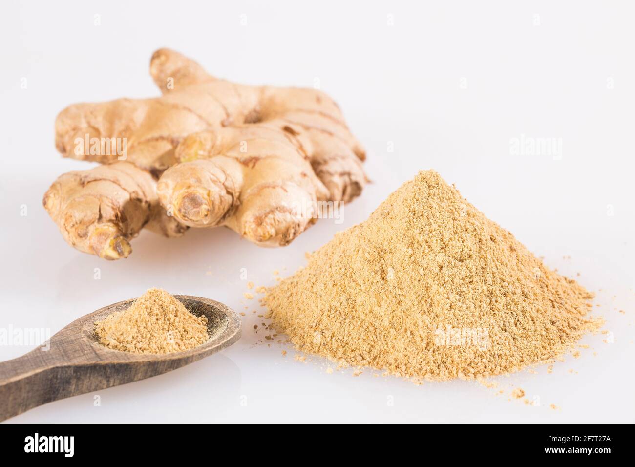 Fresh ginger root and ground ginger spice. White background Stock Photo ...