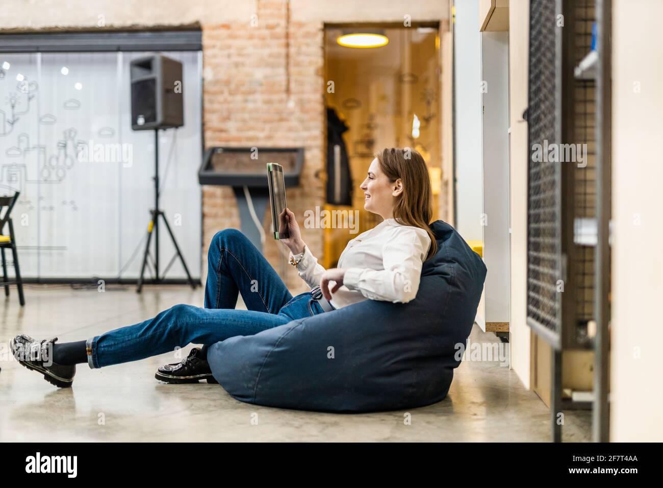 Business company employee working in the relax area - Entrepreneur with ...