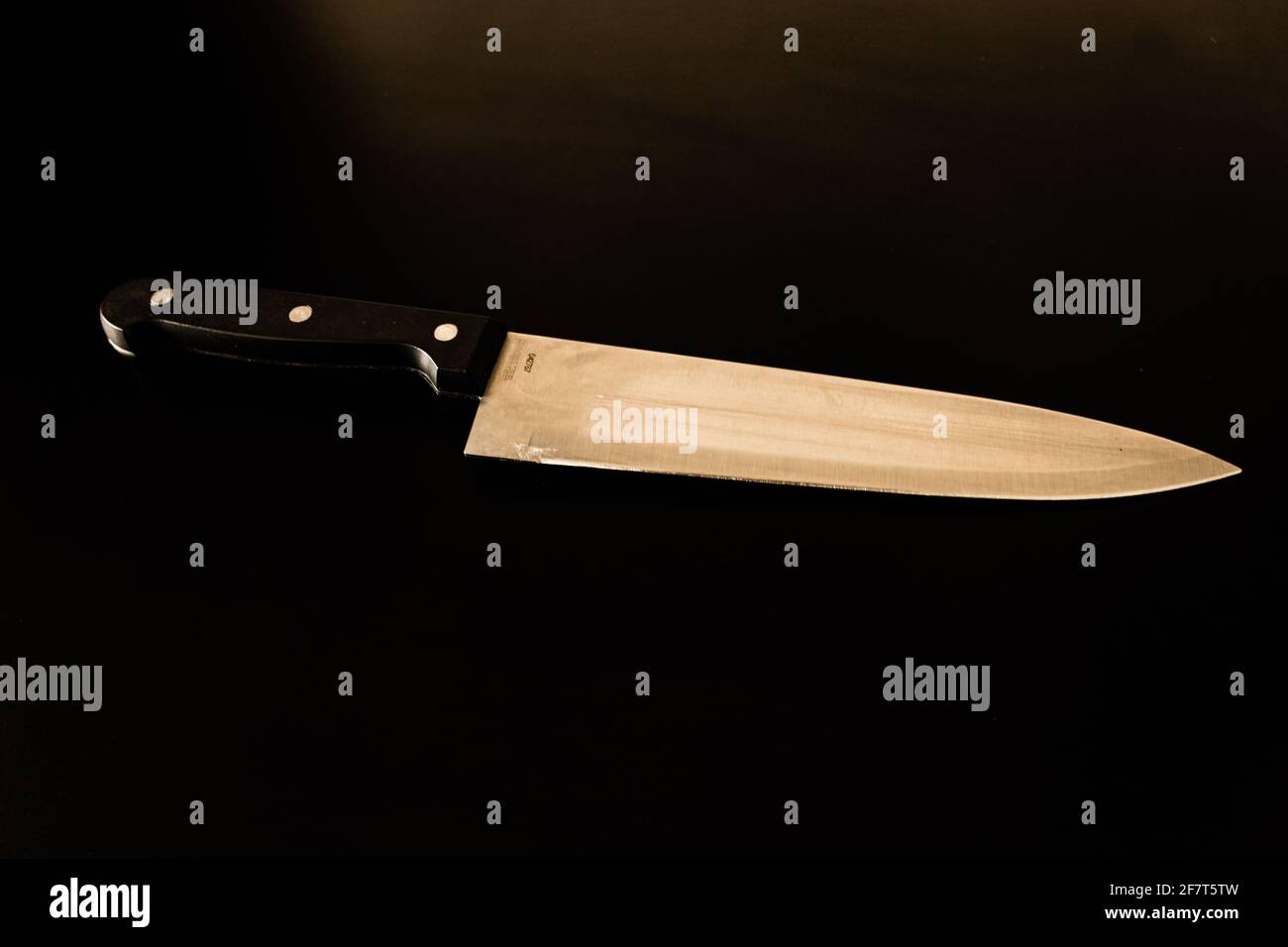 Cook in kitchen sharpen knife hi-res stock photography and images - Alamy