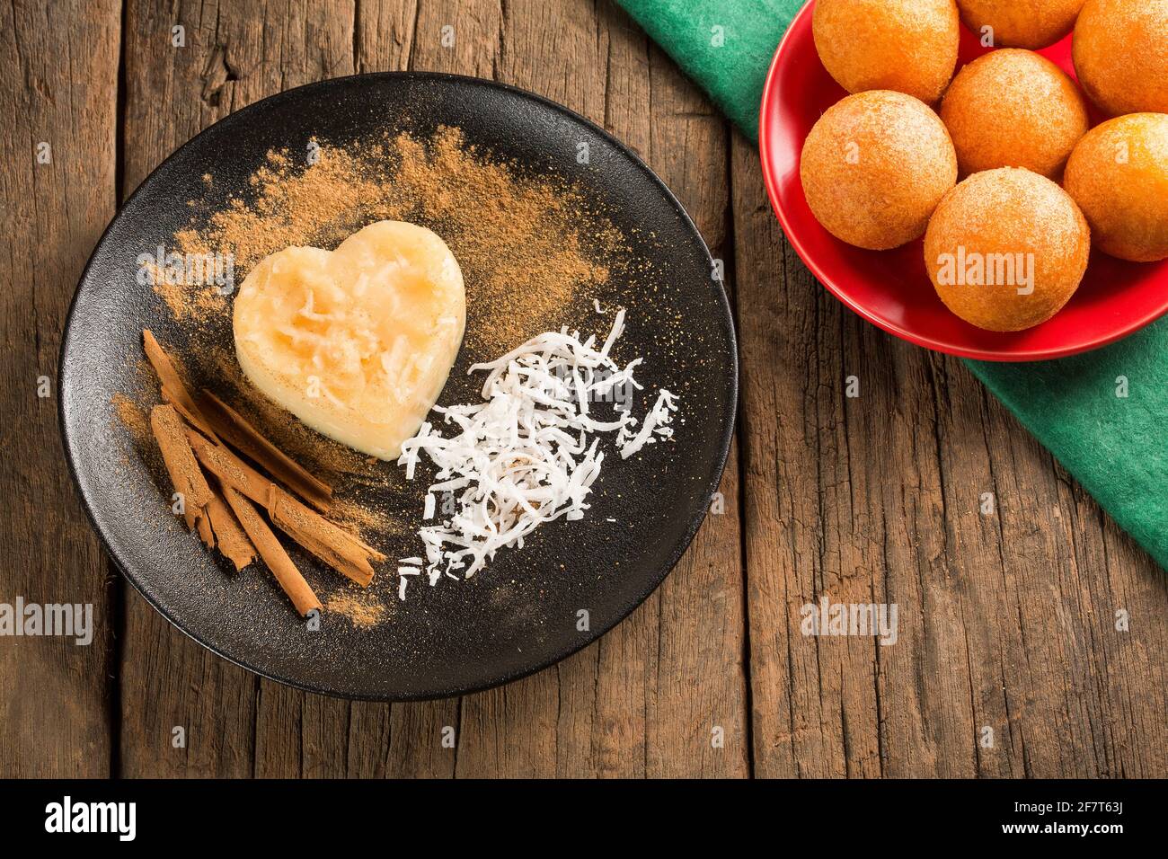 Traditional Colombian bunuelos (Deep Fried Cheese Bread) and natilla on ...