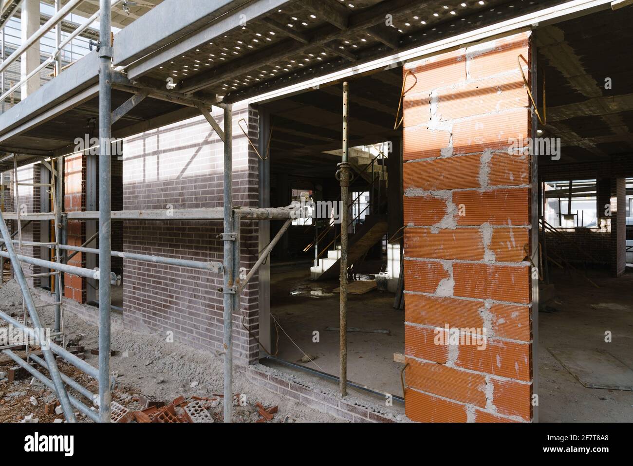 Empty unfinished building walls and equipment Stock Photo - Alamy