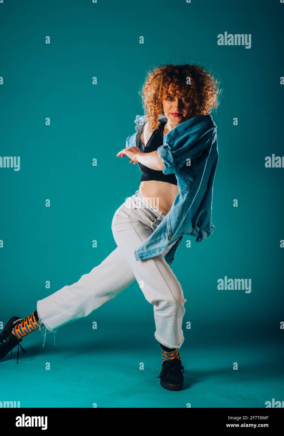 Modern dancing woman performing modern style dance moves Stock Photo ...