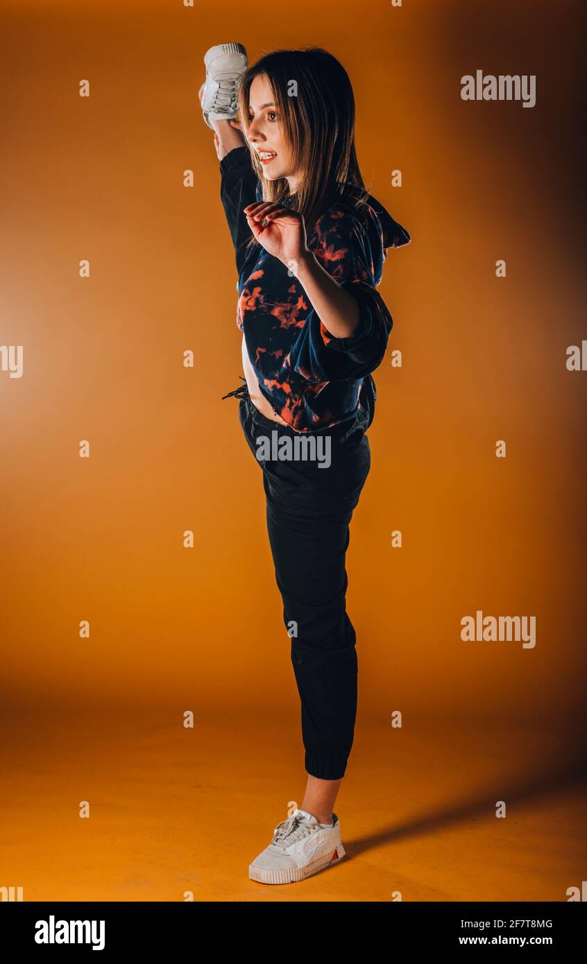 Modern dance performer practicing dance moves at the studio Stock Photo ...