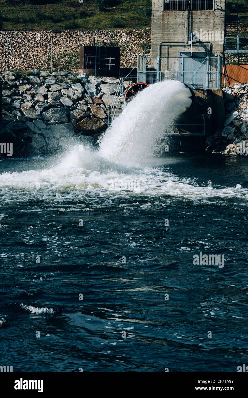Vertical shot of water discharge Stock Photo - Alamy