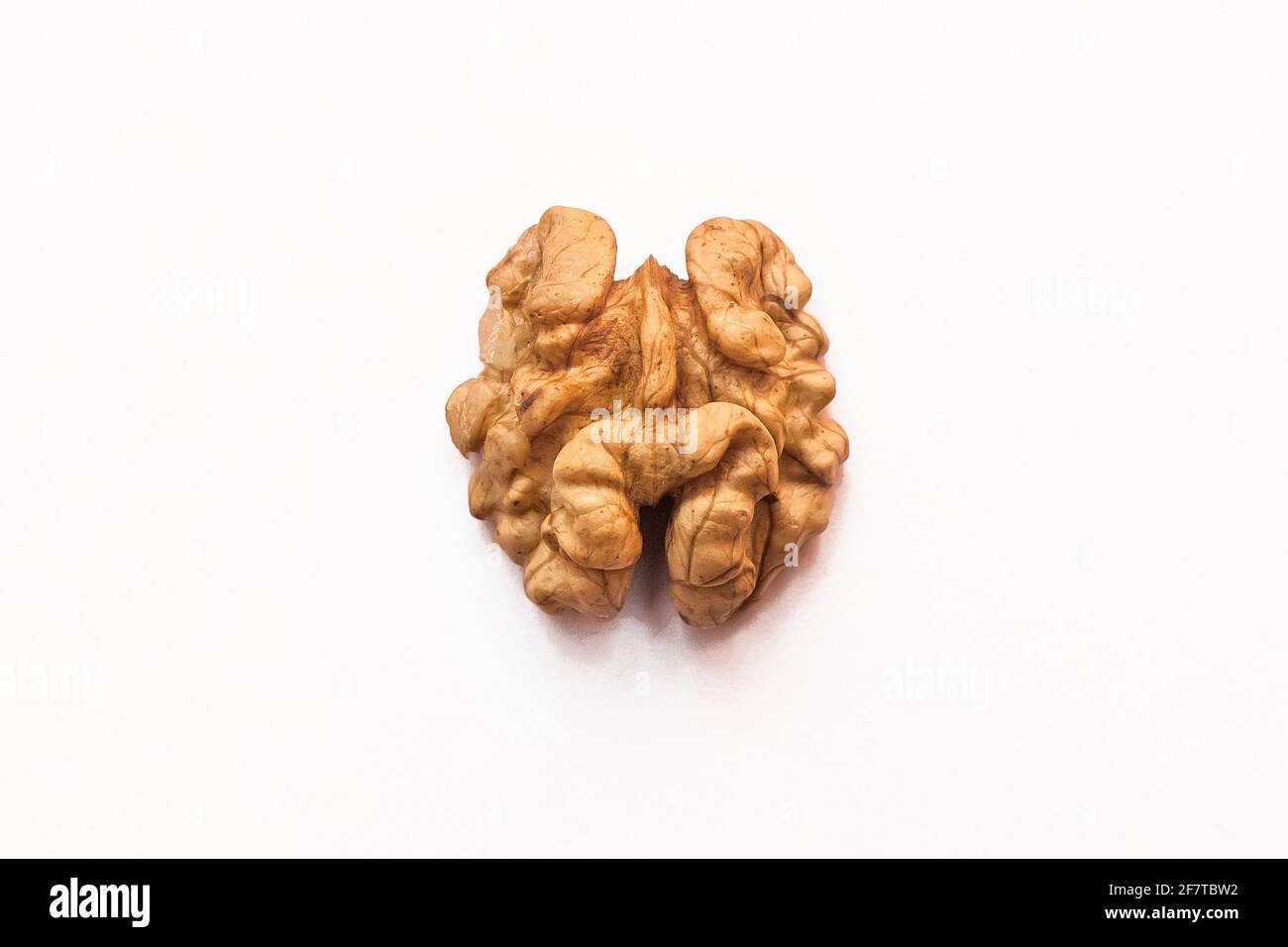 Peeled half open walnut isolated on white background, close up Stock ...