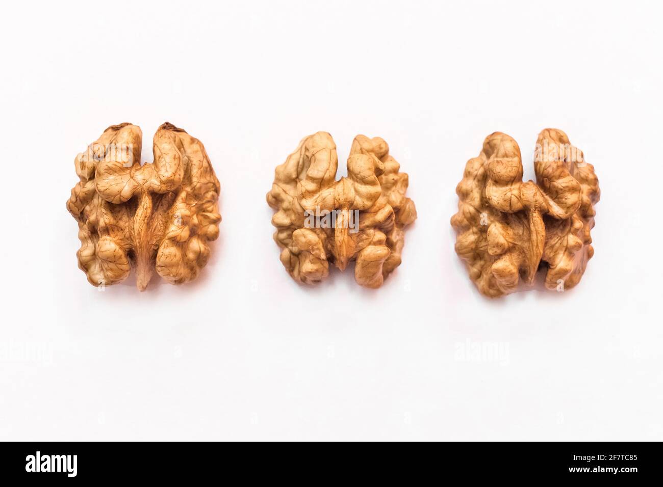 Peeled half open walnuts isolated on white background, close up Stock ...