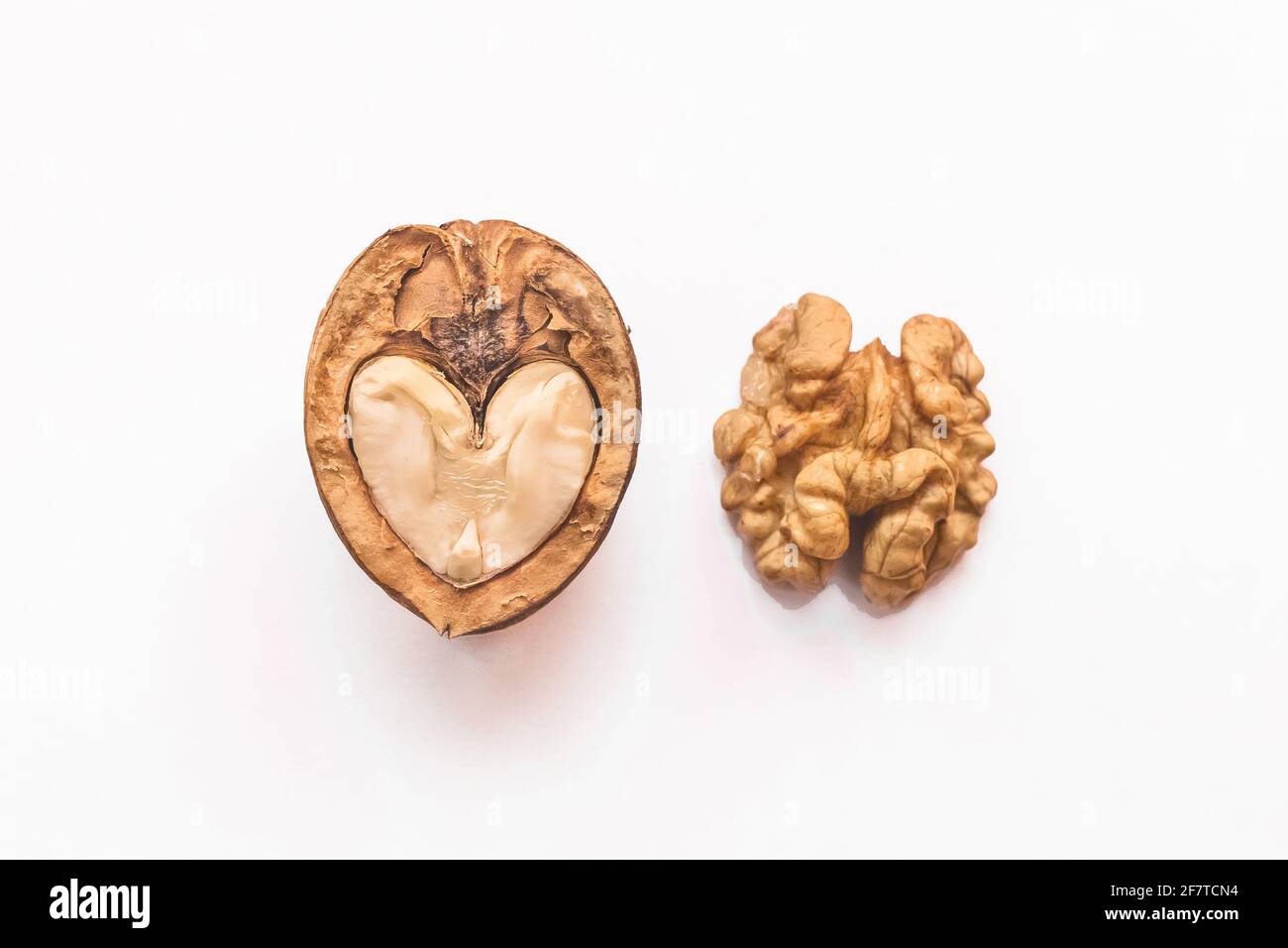 Different forms and areas of walnut. Walnut half in the form of a heart ...