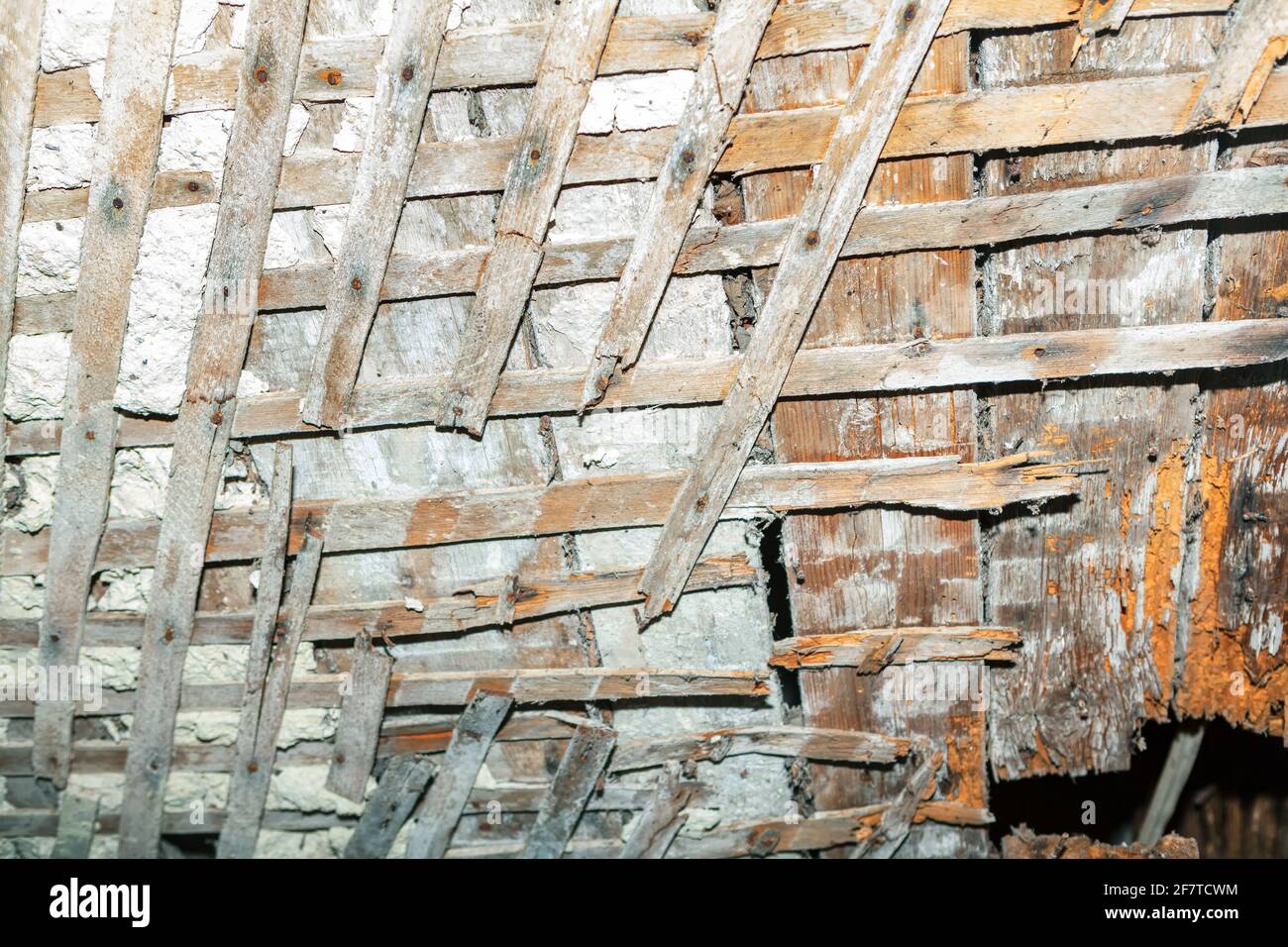 Destroyed wooden ceiling hi-res stock photography and images - Alamy