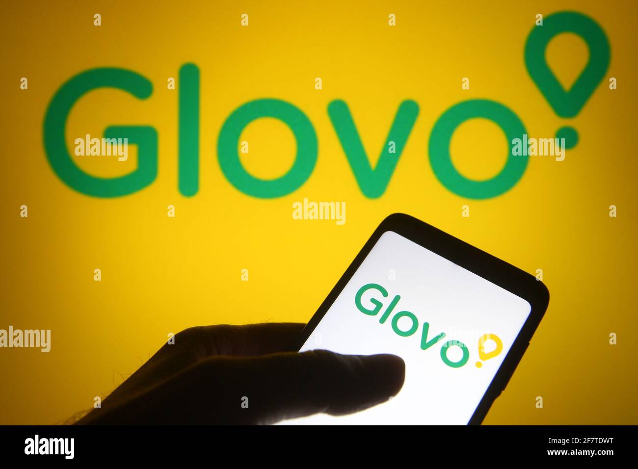 In this photo illustration the Glovo logo is seen on a smartphone ...