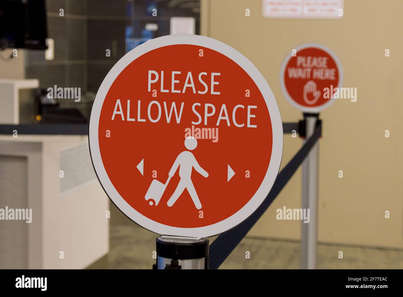 Preventive signs for COVID-19 pandemic before entering a airport ...