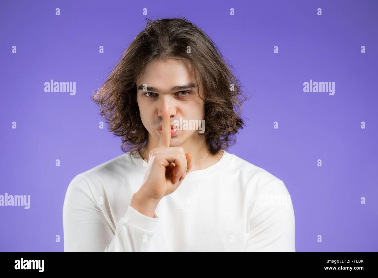 Man finger over lip hi-res stock photography and images - Alamy