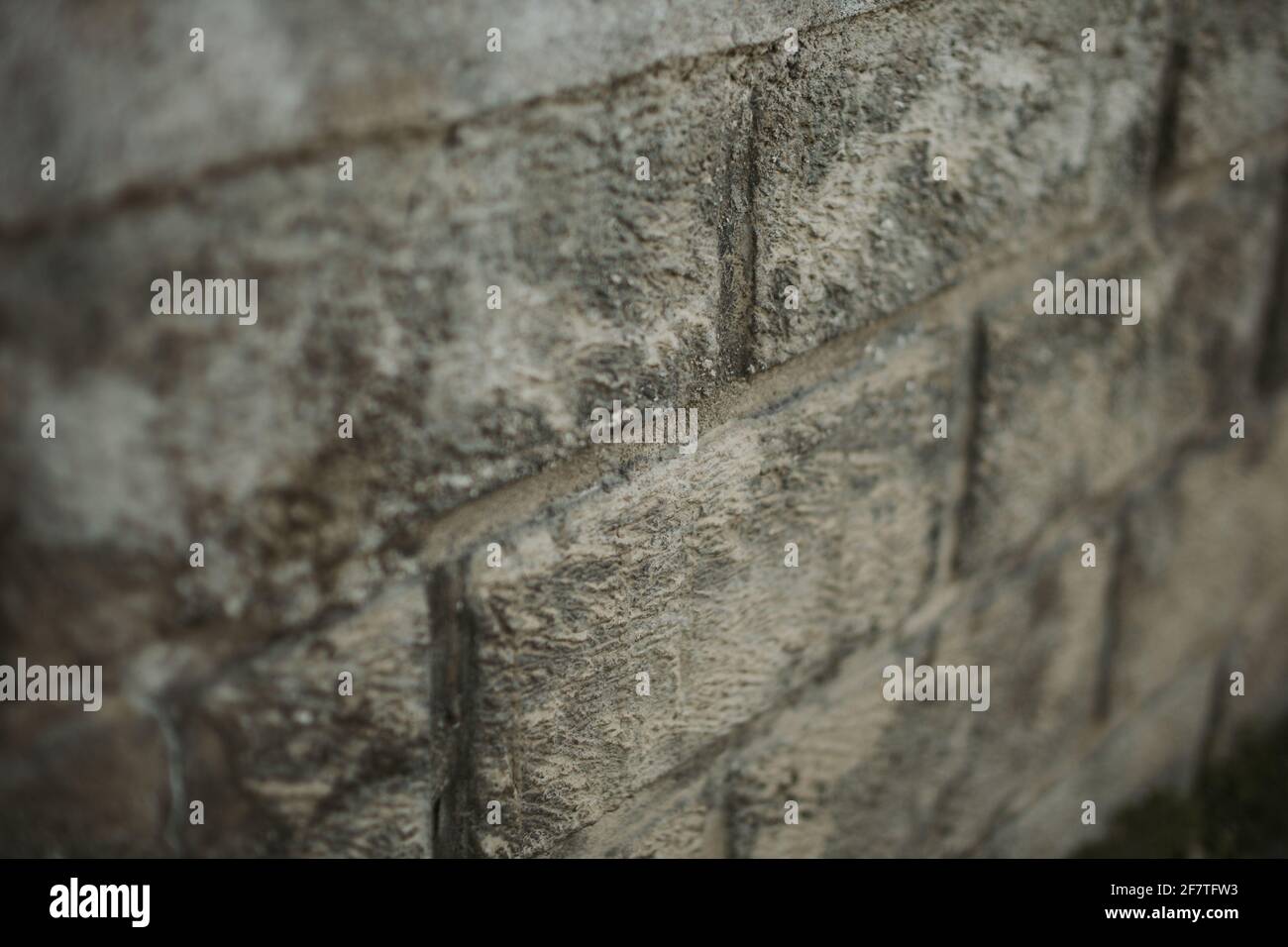Side view of a grunge wall texture with rectangular tiles Stock Photo ...