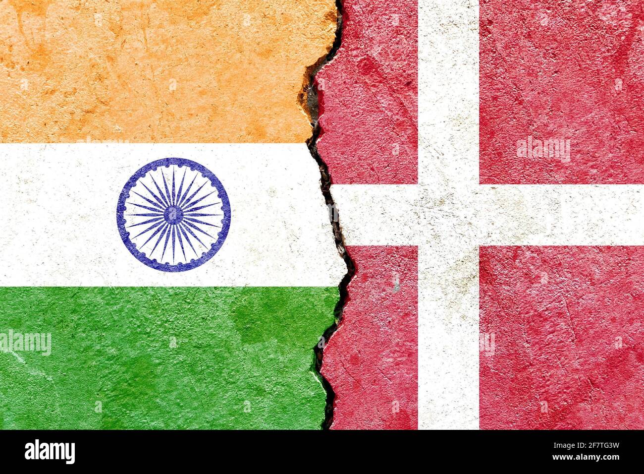 Flags of India and Denmark isolated on cracked wall background Stock ...