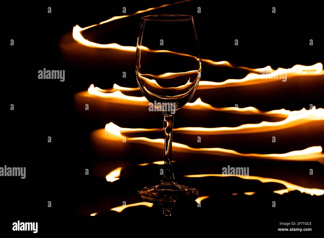 fire and wine glass, copy space, use as background Stock Photo - Alamy
