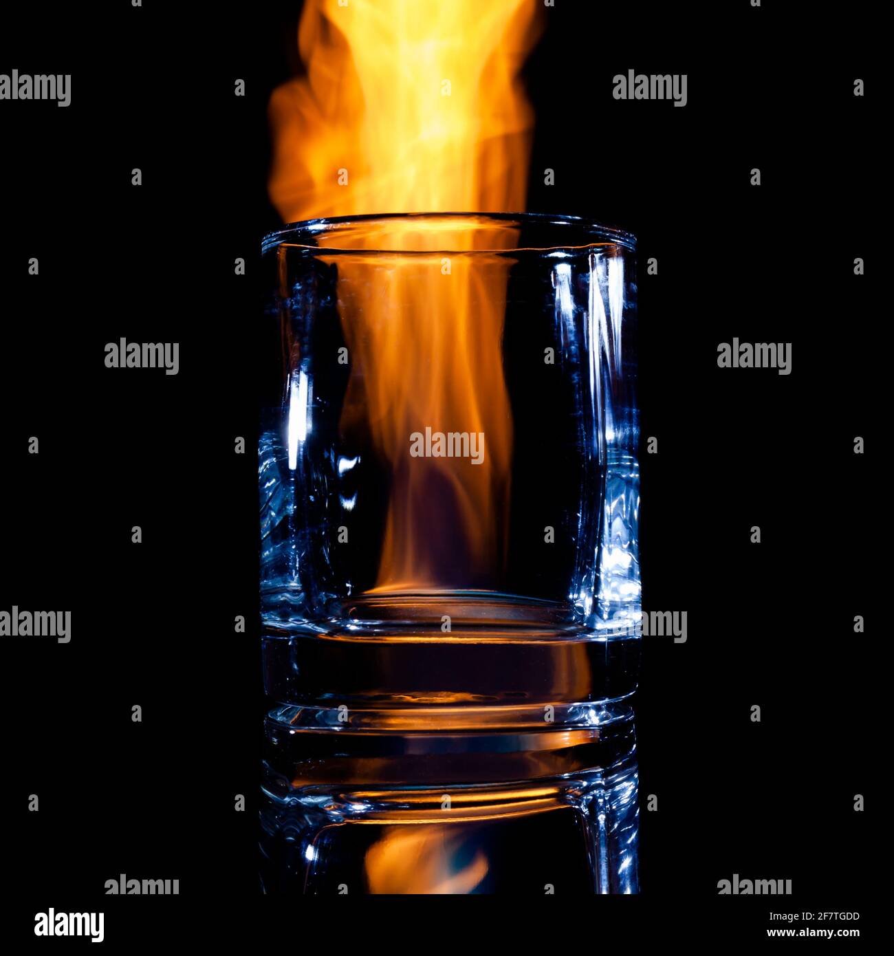 burning empty glass glass, copy space, isolate Stock Photo - Alamy