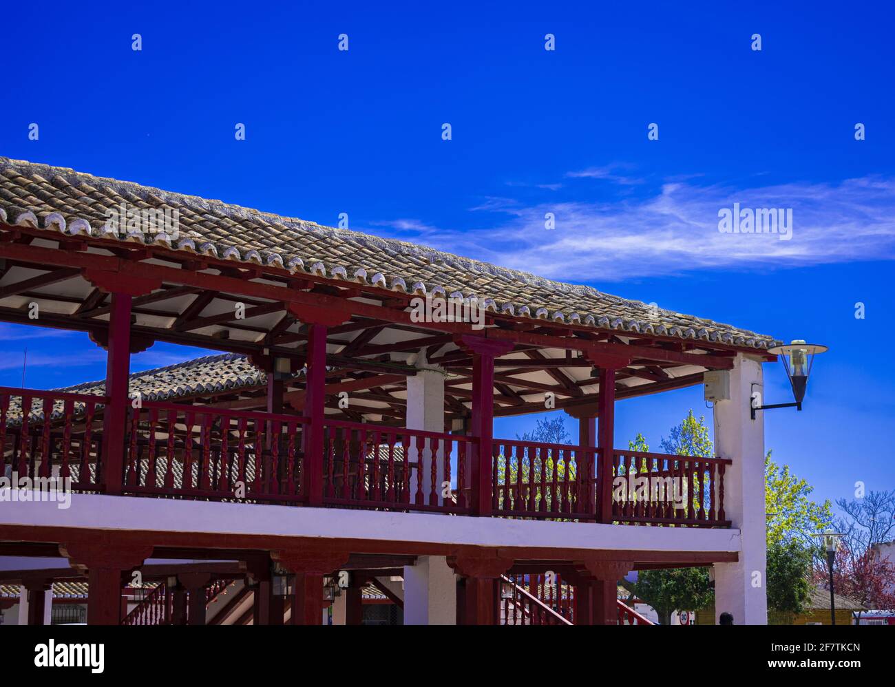 Selective focus of a beautiful wooden veranda against a blue sky ...