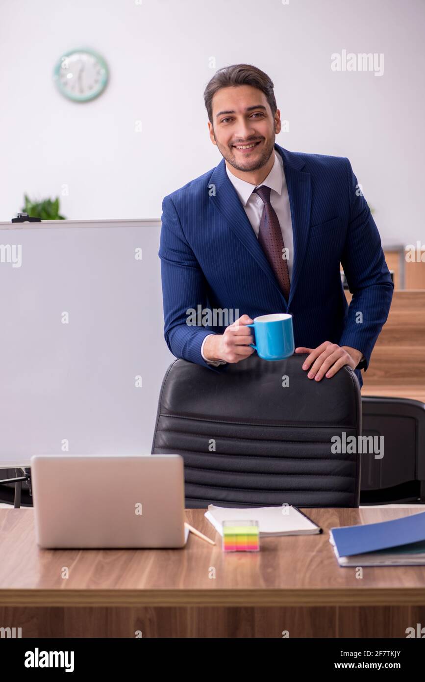 Young attractive employer in teleconference concept Stock Photo - Alamy