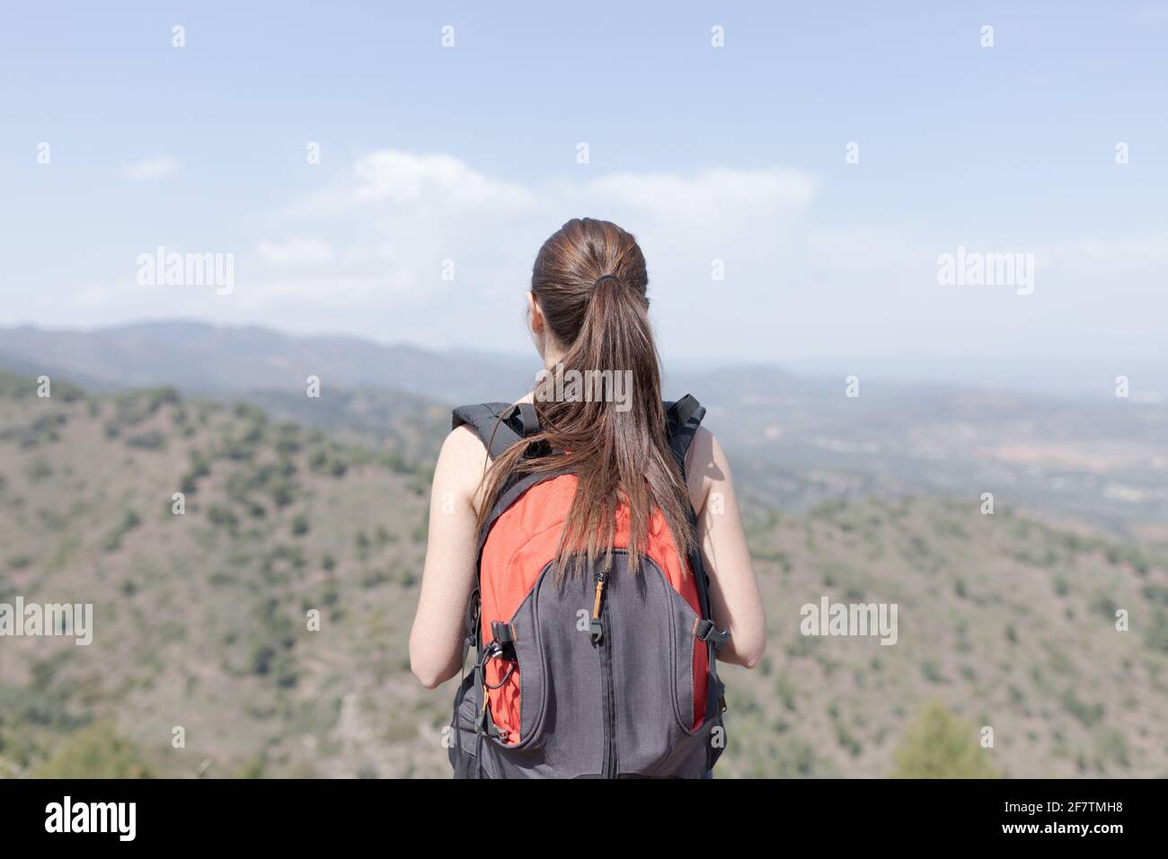 girl with backpack in the mountain Stock Photo - Alamy