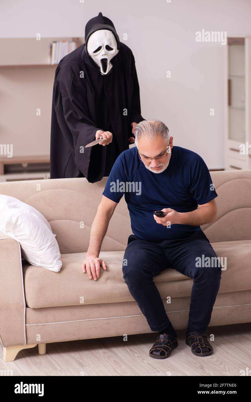 Devil coming to old dying man Stock Photo - Alamy