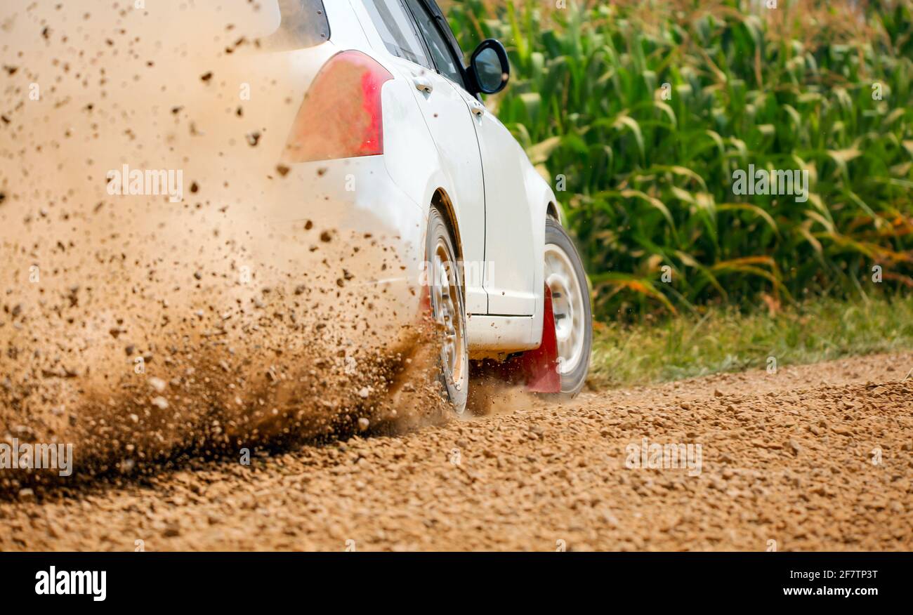 Rally race car drifting on dirt track Stock Photo - Alamy