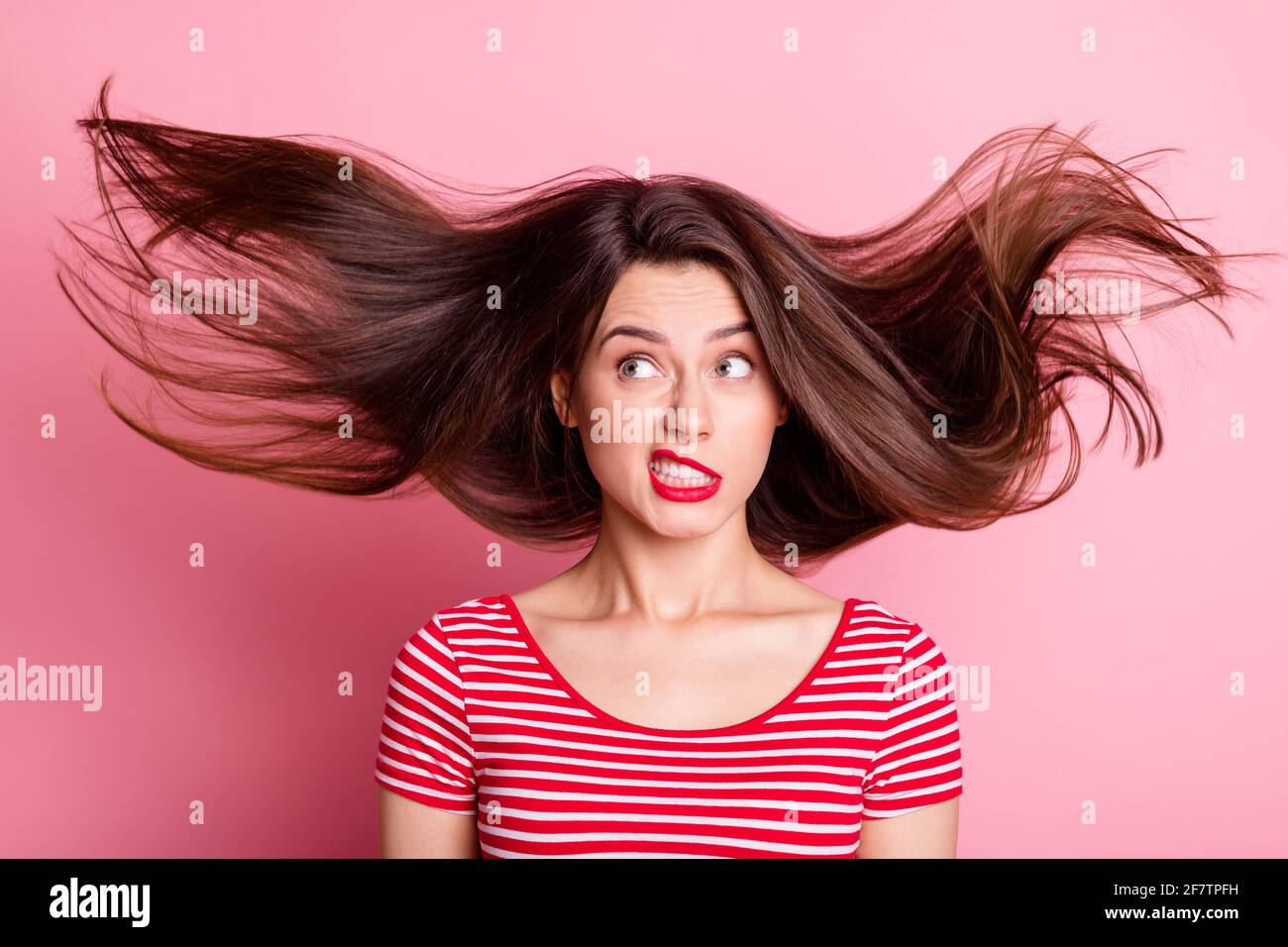 Photo of pretty unsatisfied person look empty space hair flying grin ...