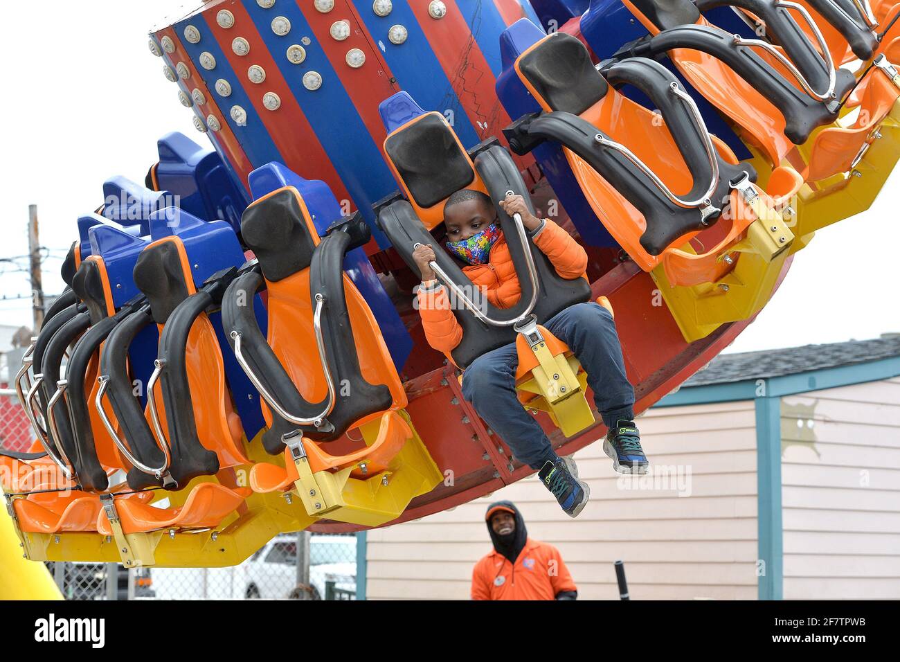New York, USA. 09th Apr, 2021. A child takes a spin on the Luna 360 ...