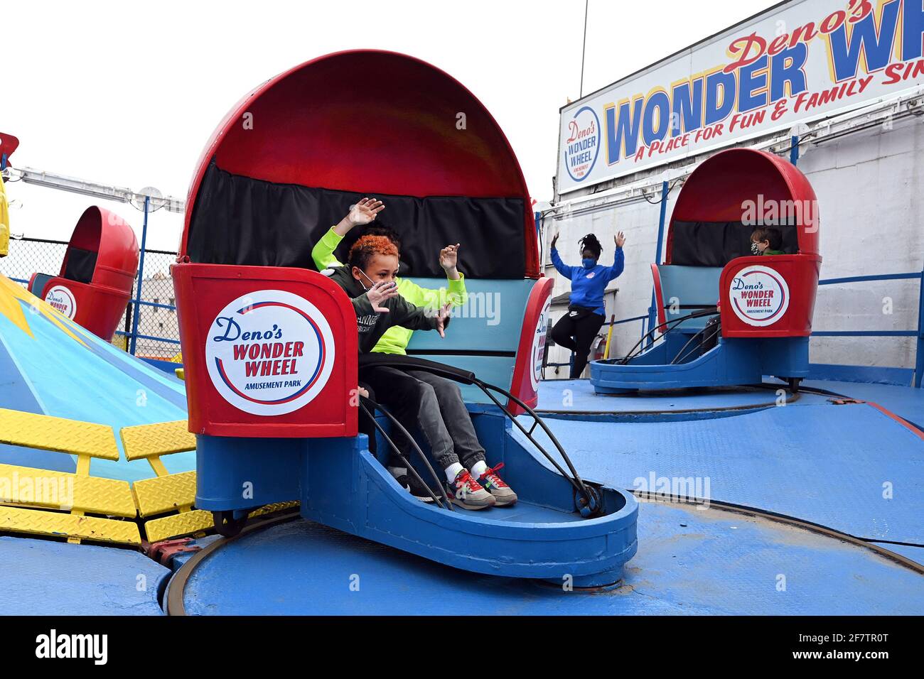 Children are seen on the Tilt-a-Whirl ride at Deno’s Wonder Wheel ...