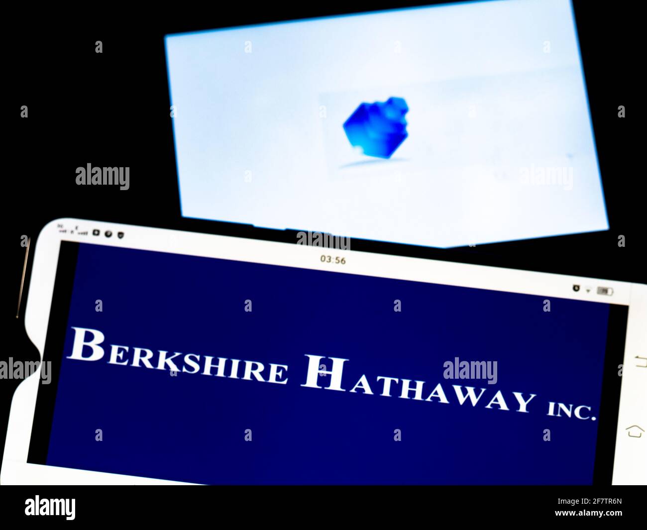 In this photo illustration Berkshire Hathaway Inc. logo seen displayed ...