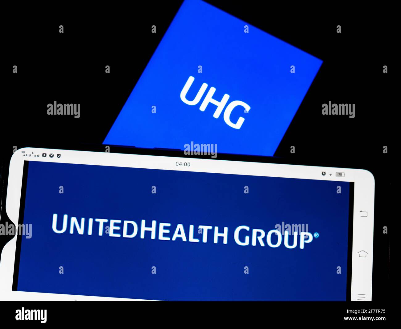 In this photo illustration United Health Group Inc. logo seen displayed ...