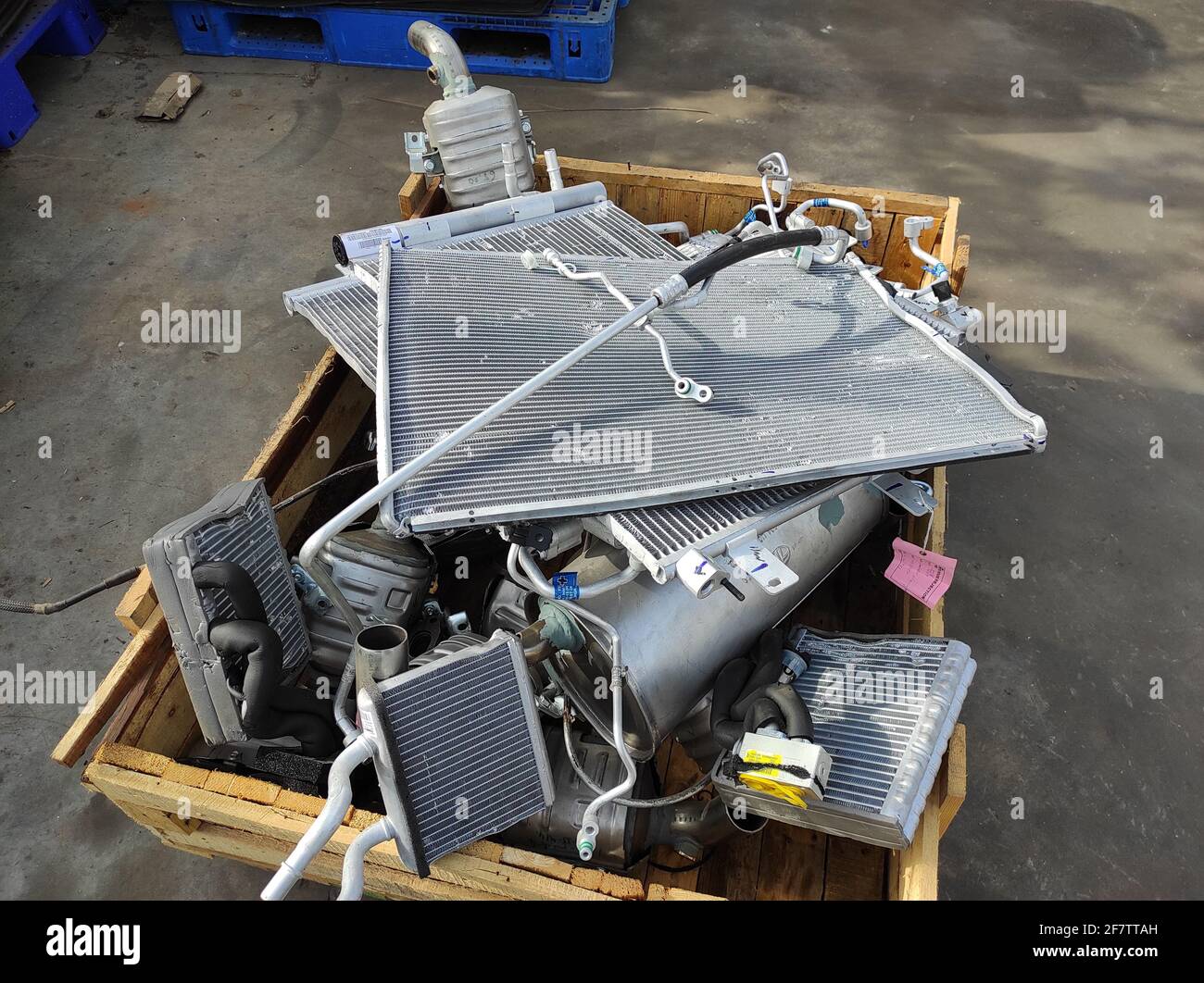 Box full of spare parts for cars Stock Photo - Alamy